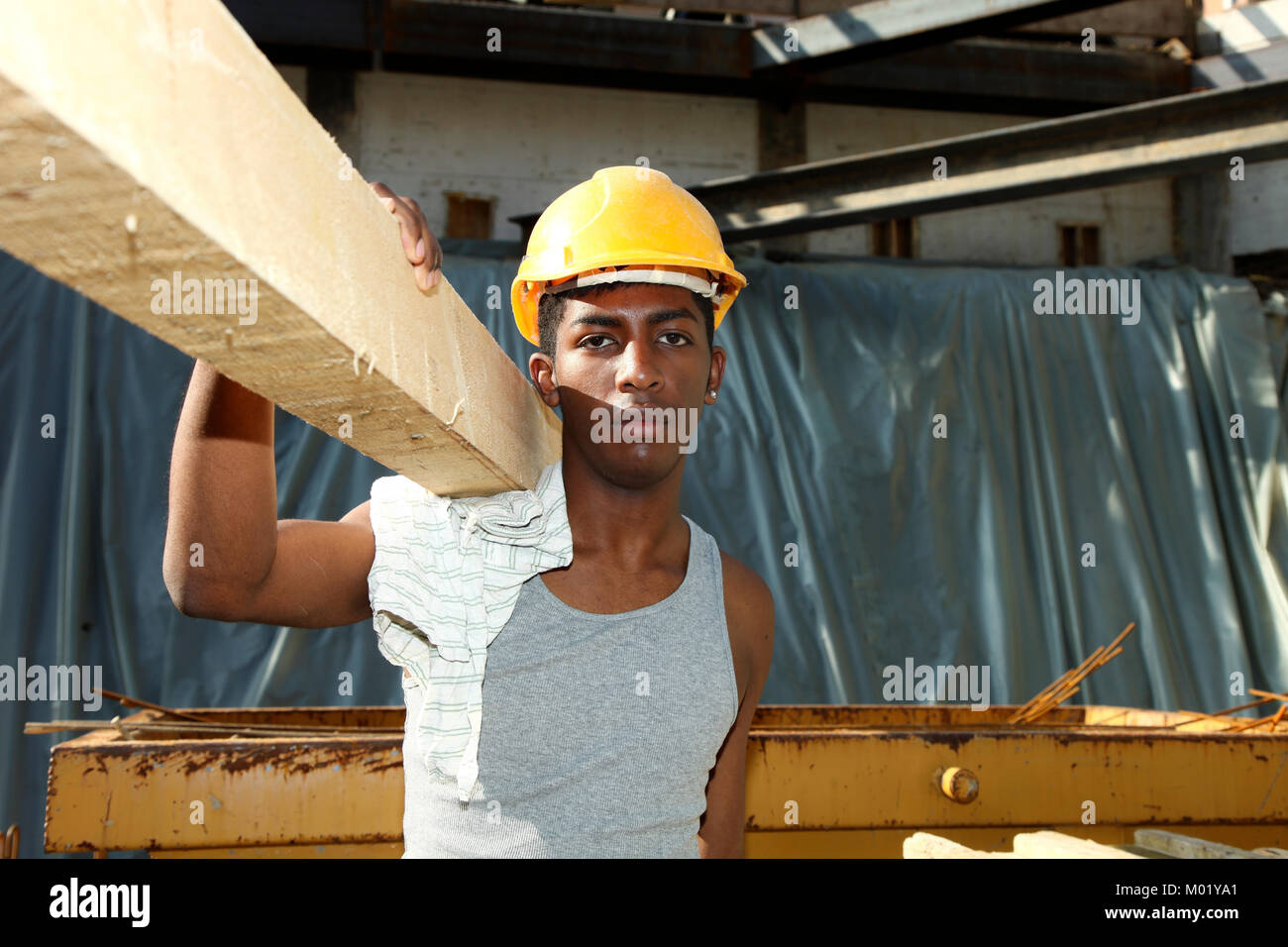 young black man working in construction site Stock Photo - Alamy
