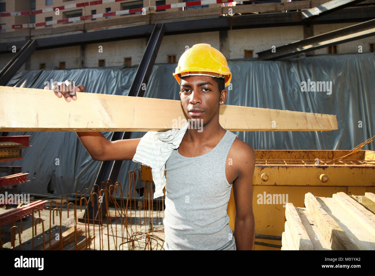 young black man working in construction site Stock Photo - Alamy