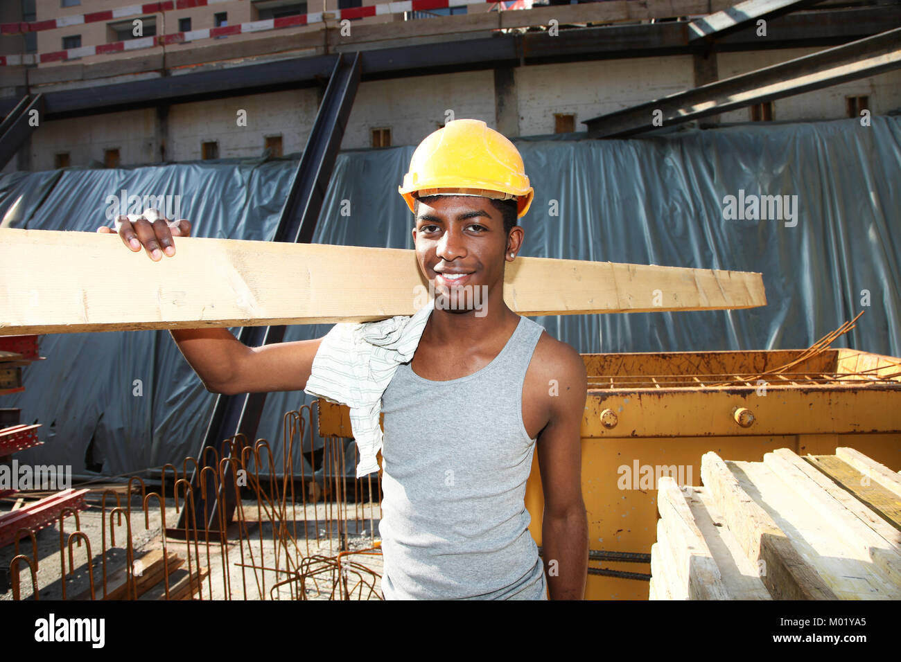 young black man working in construction site Stock Photo - Alamy