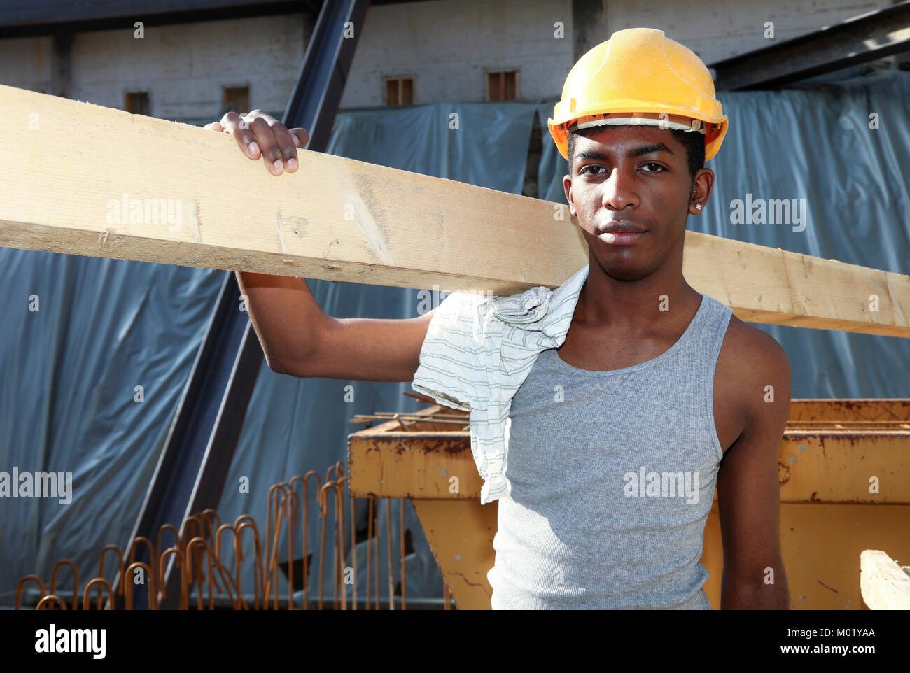 young black man working in construction site Stock Photo - Alamy