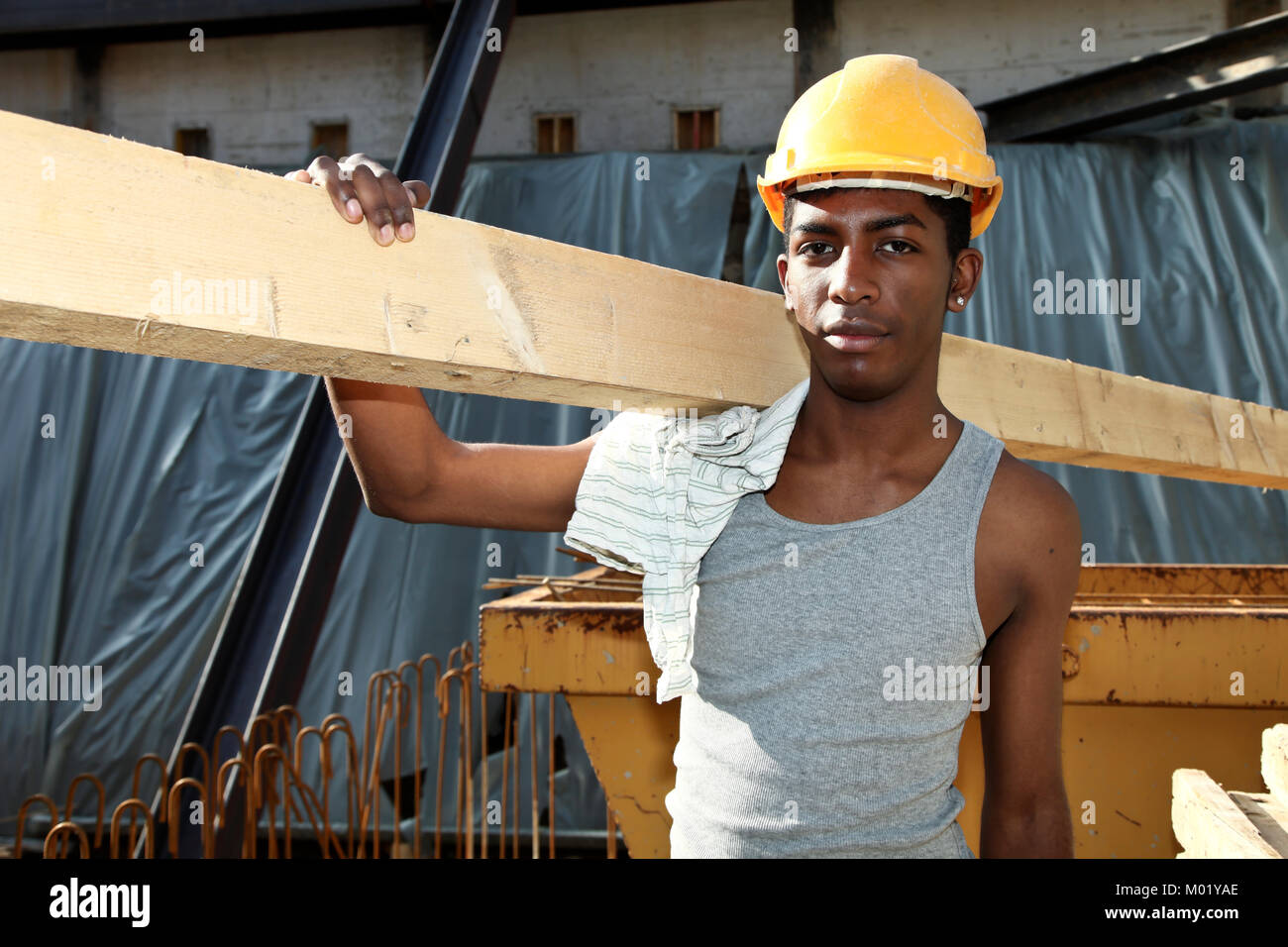 young black man working in construction site Stock Photo - Alamy