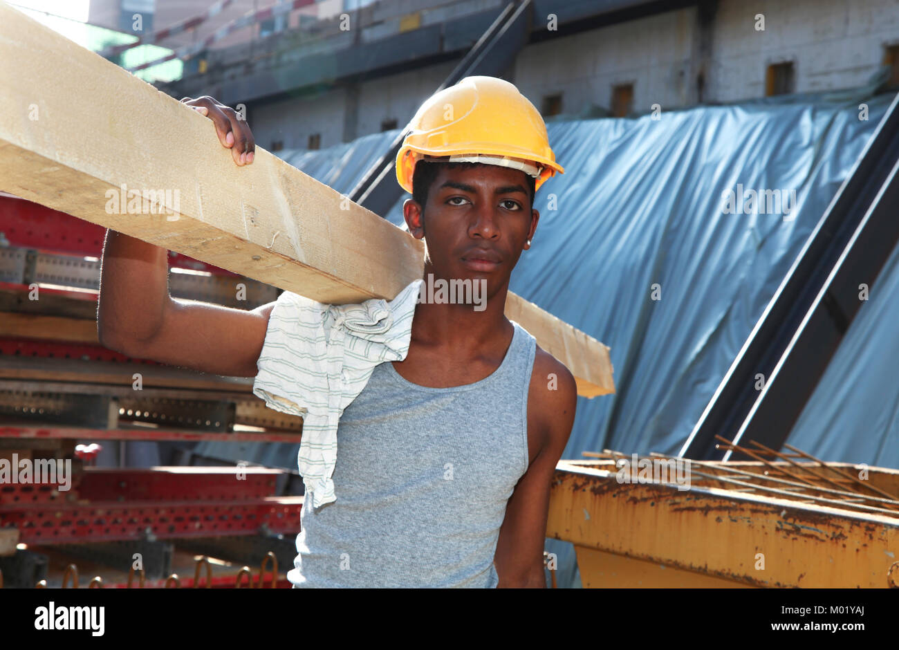 young black man working in construction site Stock Photo - Alamy