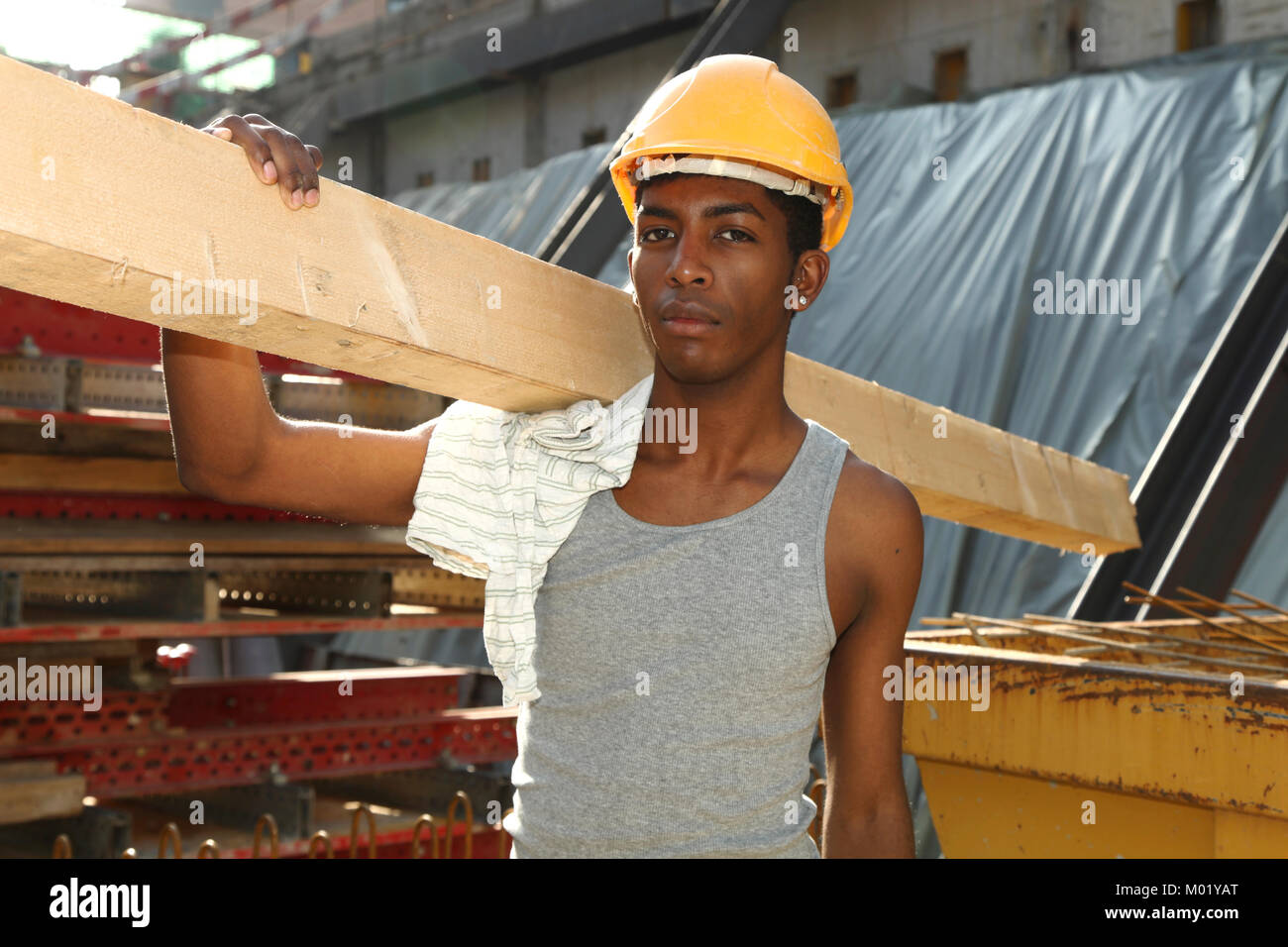 young black man working in construction site Stock Photo - Alamy