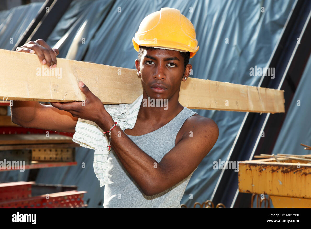 young black man working in construction site Stock Photo - Alamy