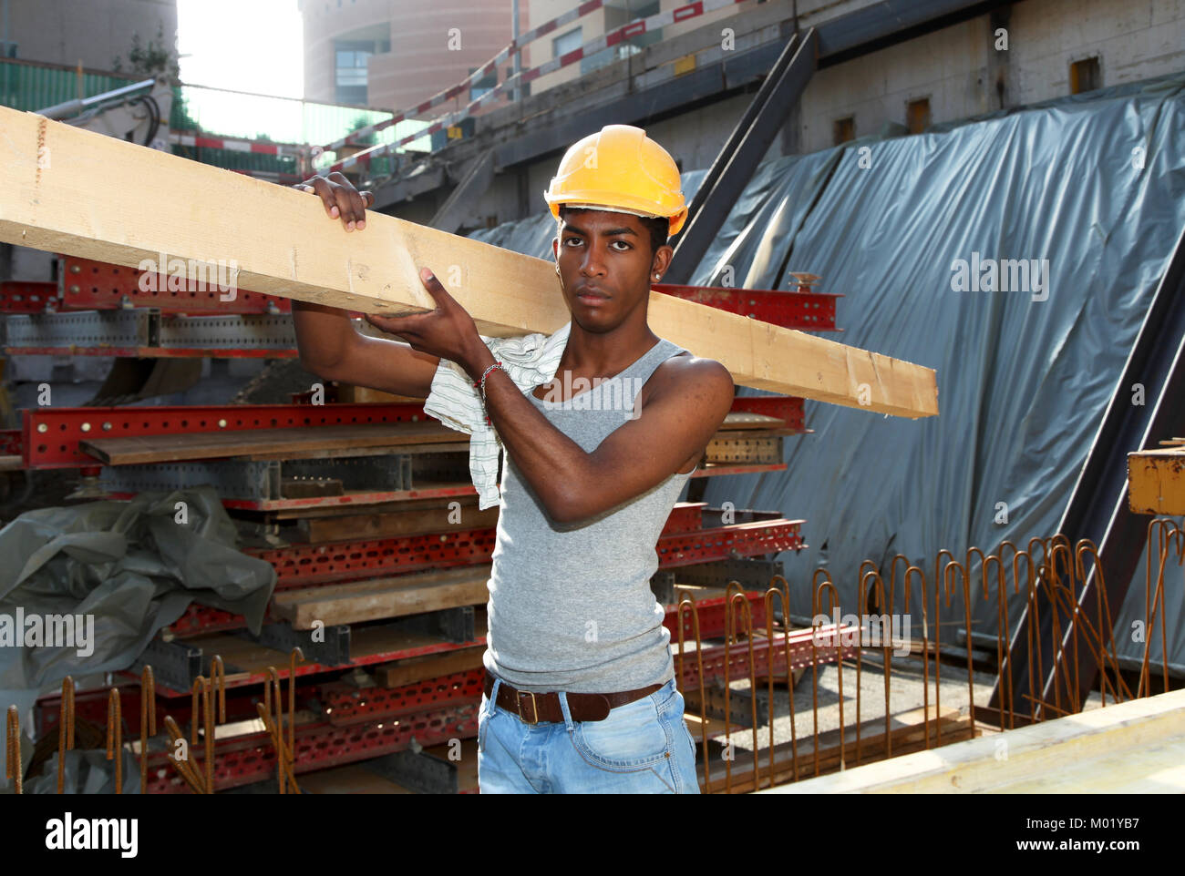 young black man working in construction site Stock Photo - Alamy