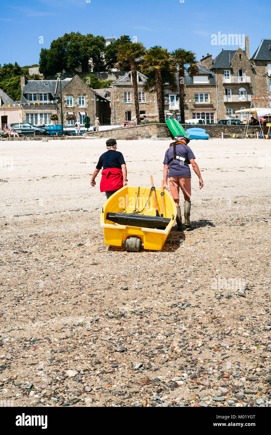 Fisherman carry boat on the beach hi-res stock photography and images ...