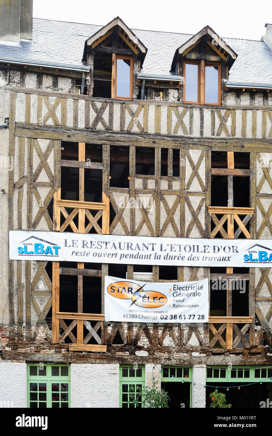 ORLEANS, FRANCE - JULY 9, 2010: restoration of medieval half-timbered ...
