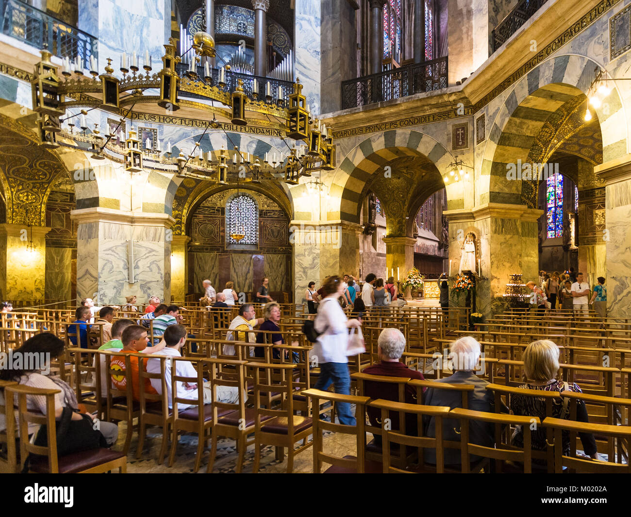 AACHEN, GERMANY - JUNE 27, 2010: visitors under Barbarossa Chandelier ...