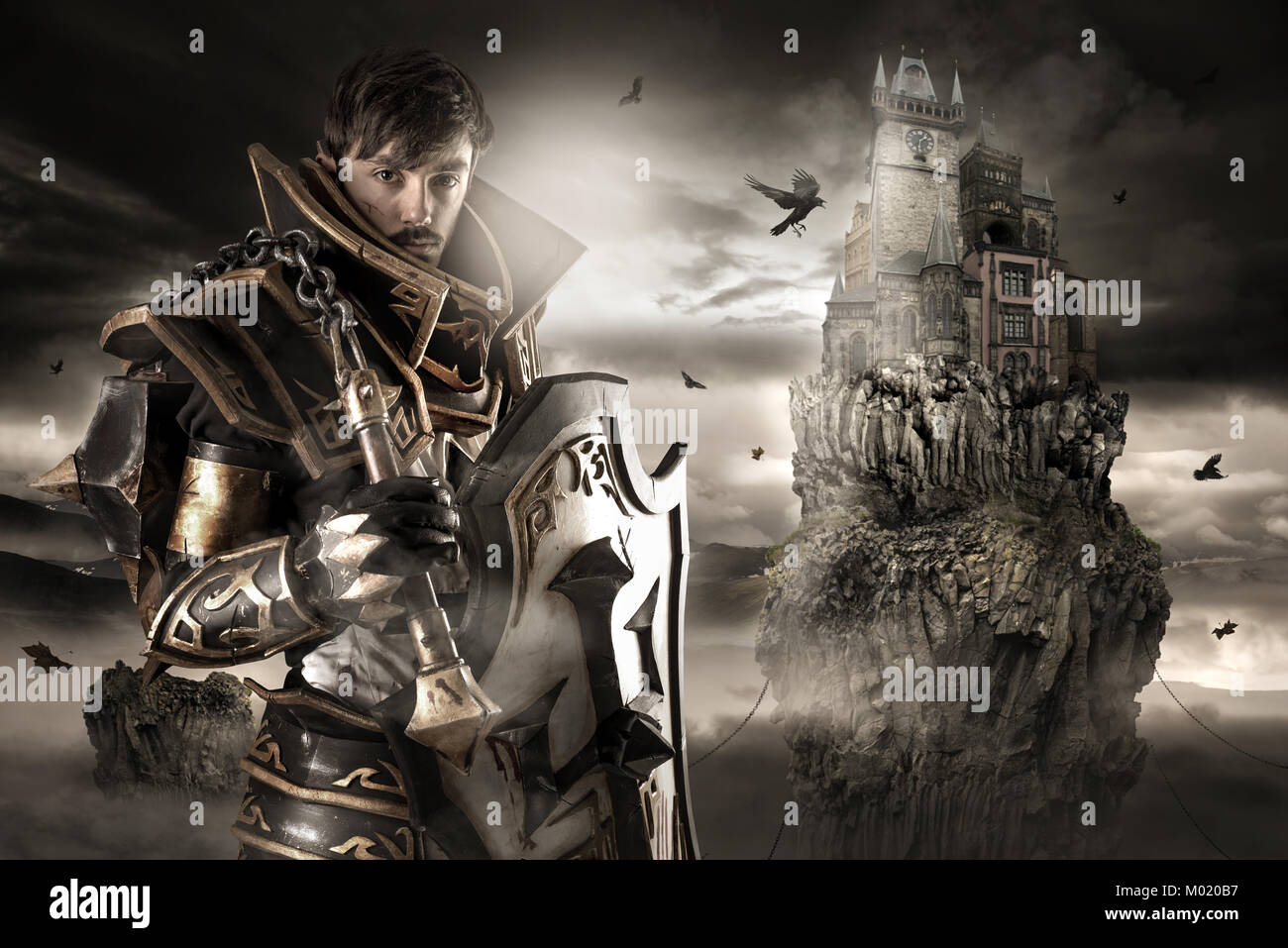 Young man cosplaying with fantasy knight costume over a fantasy ...