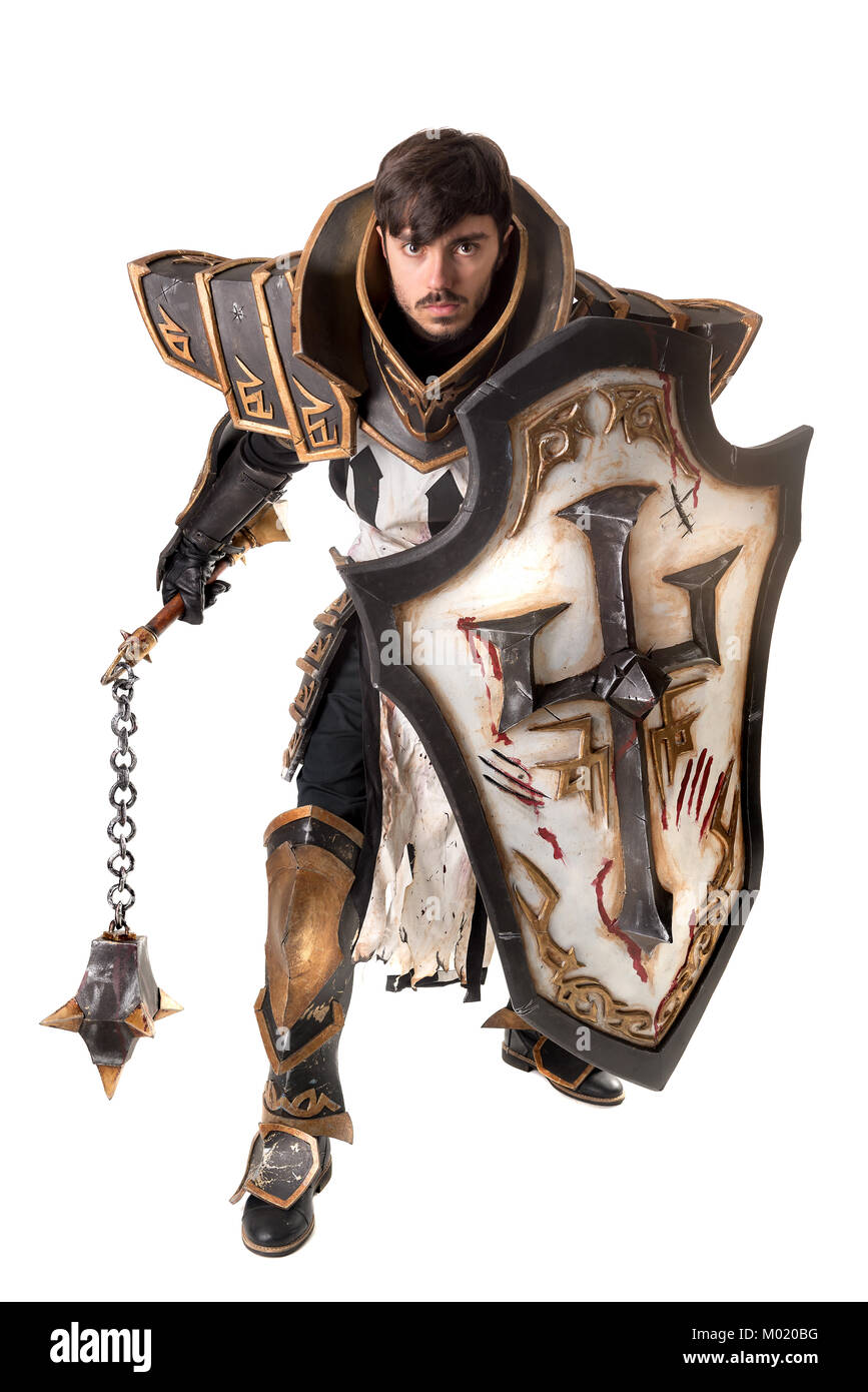 Young man cosplaying with fantasy knight costume Stock Photo - Alamy