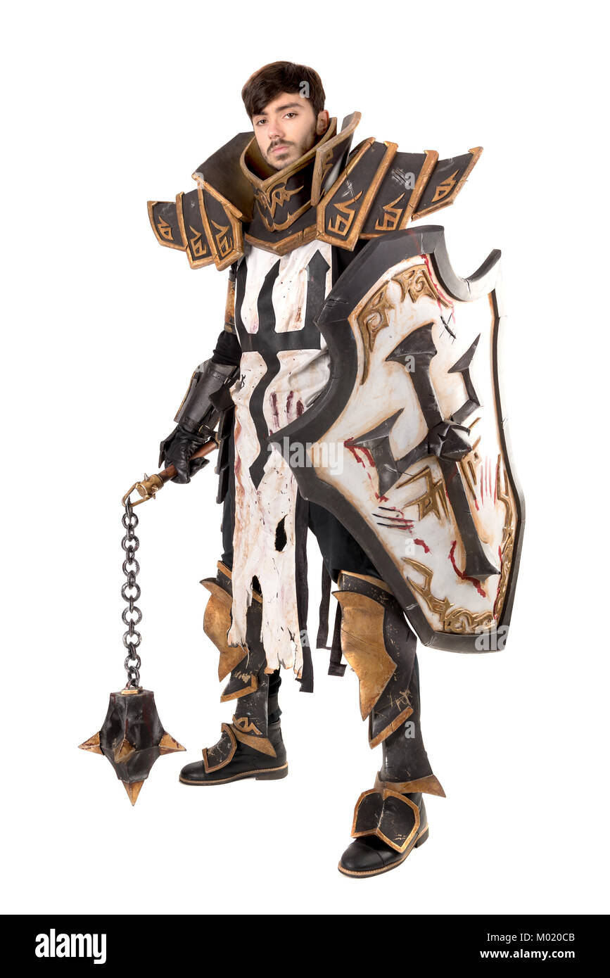 Young man cosplaying with fantasy knight costume Stock Photo - Alamy