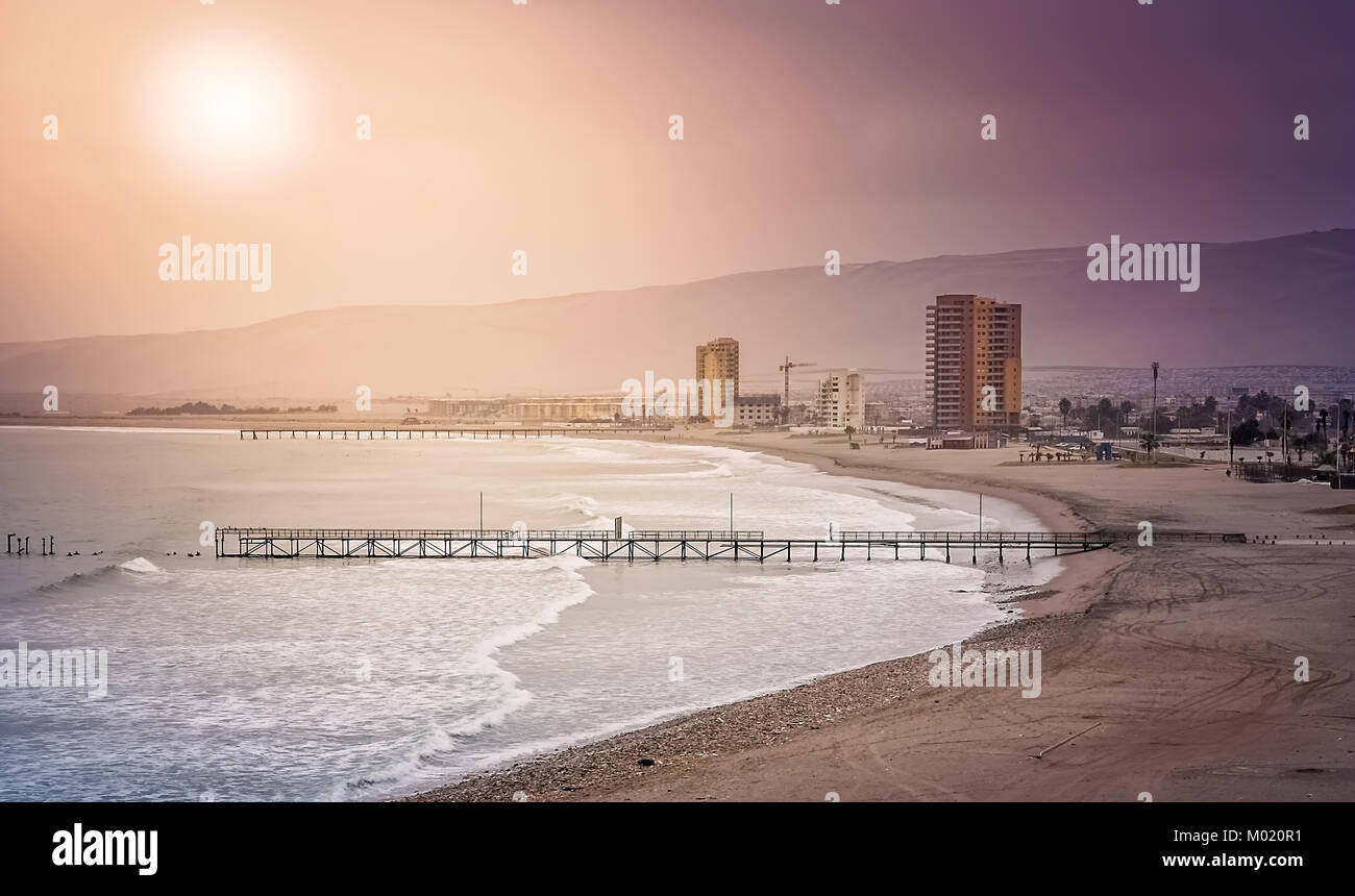 Sun over the beach in Arica in northern Chile, south America Stock ...