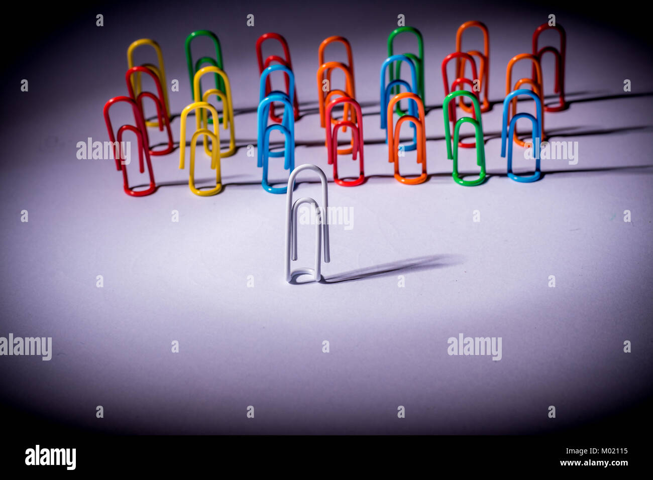 life of paper clips stalking people's problems Stock Photo - Alamy