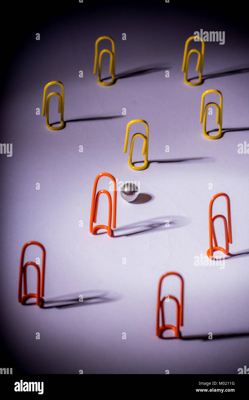 life of paper clips stalking people's problems Stock Photo - Alamy