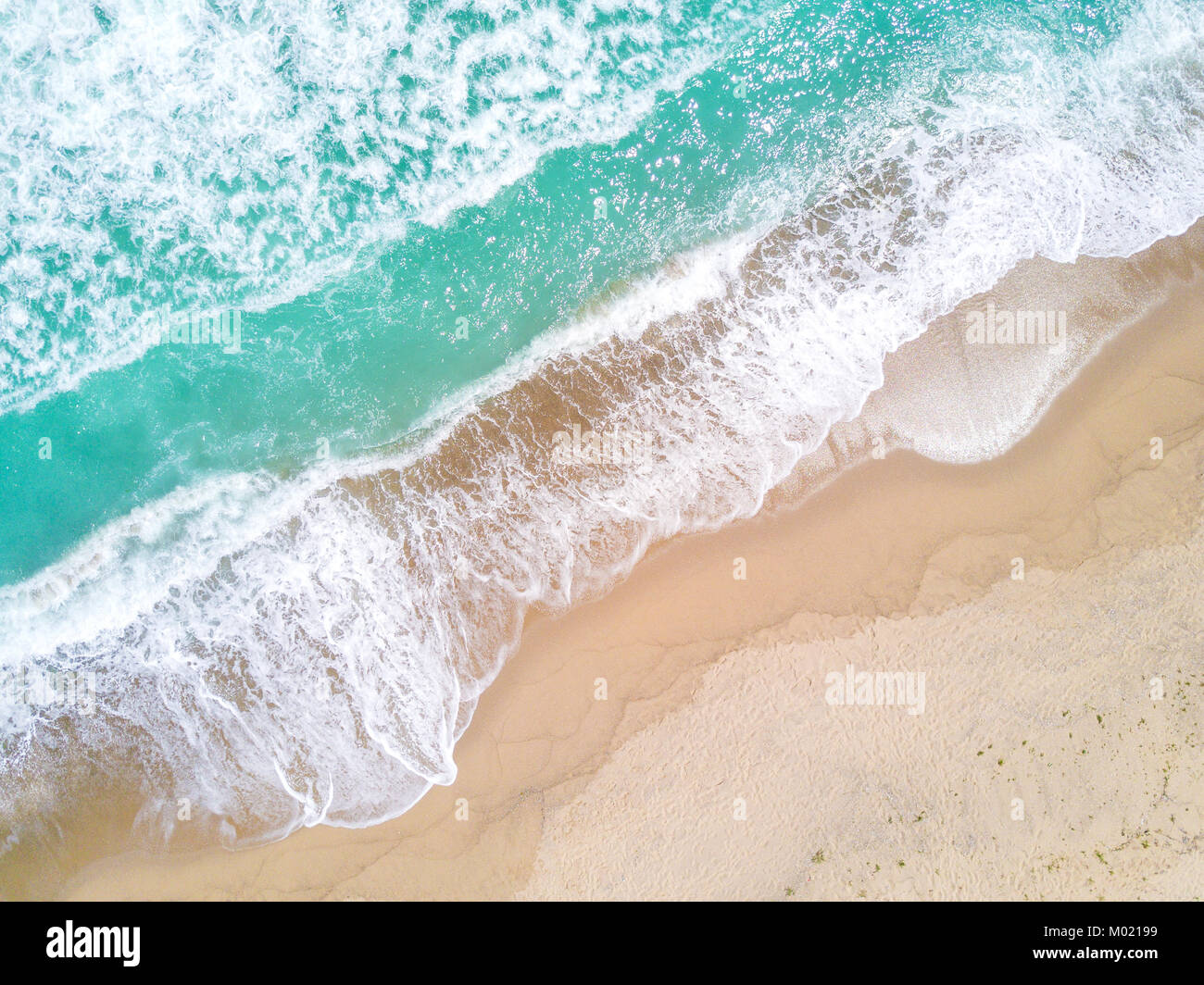 Aerial view of sandy beach and ocean with waves Stock Photo - Alamy