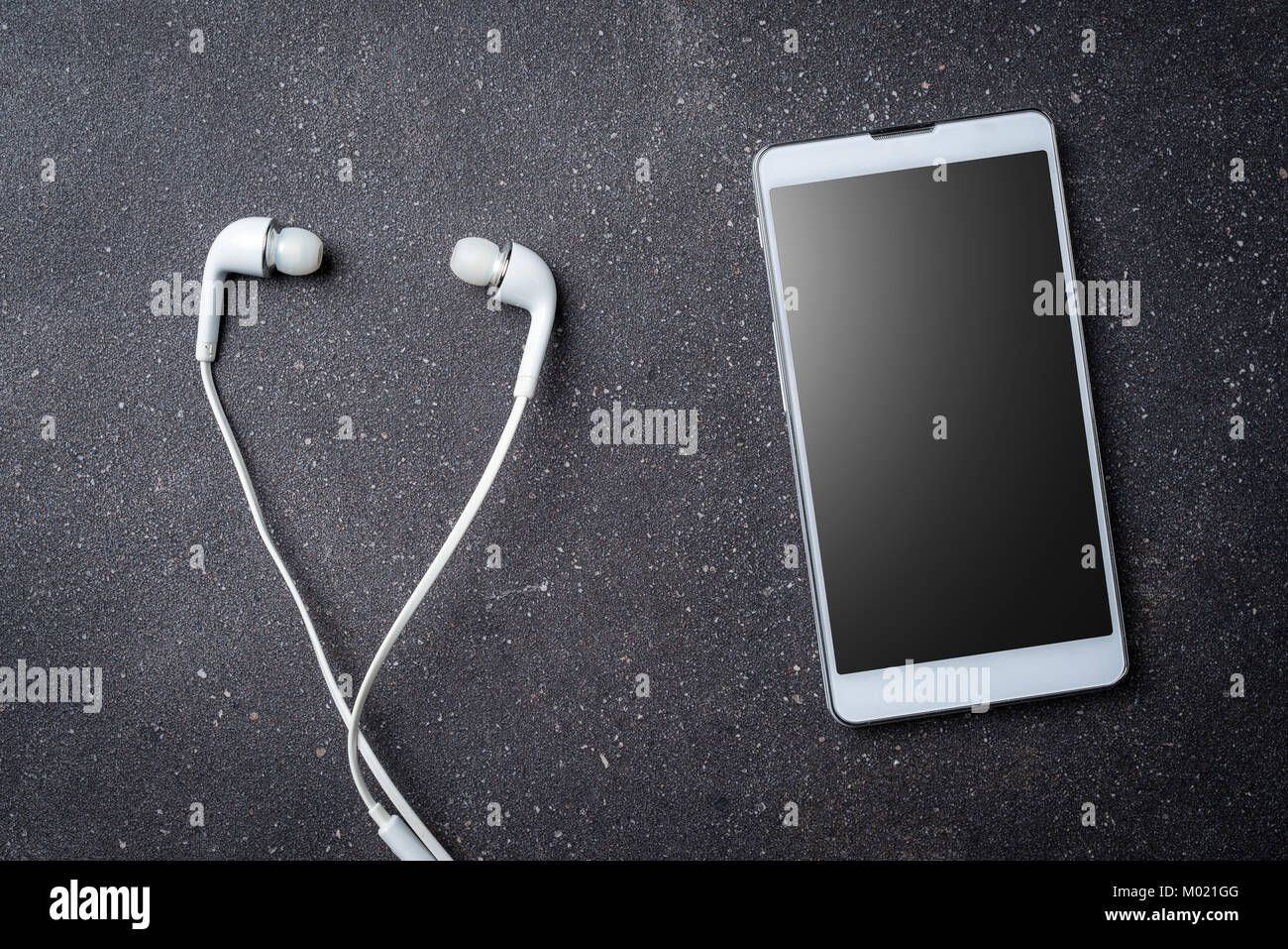 Cell earphones hi-res stock photography and images - Alamy