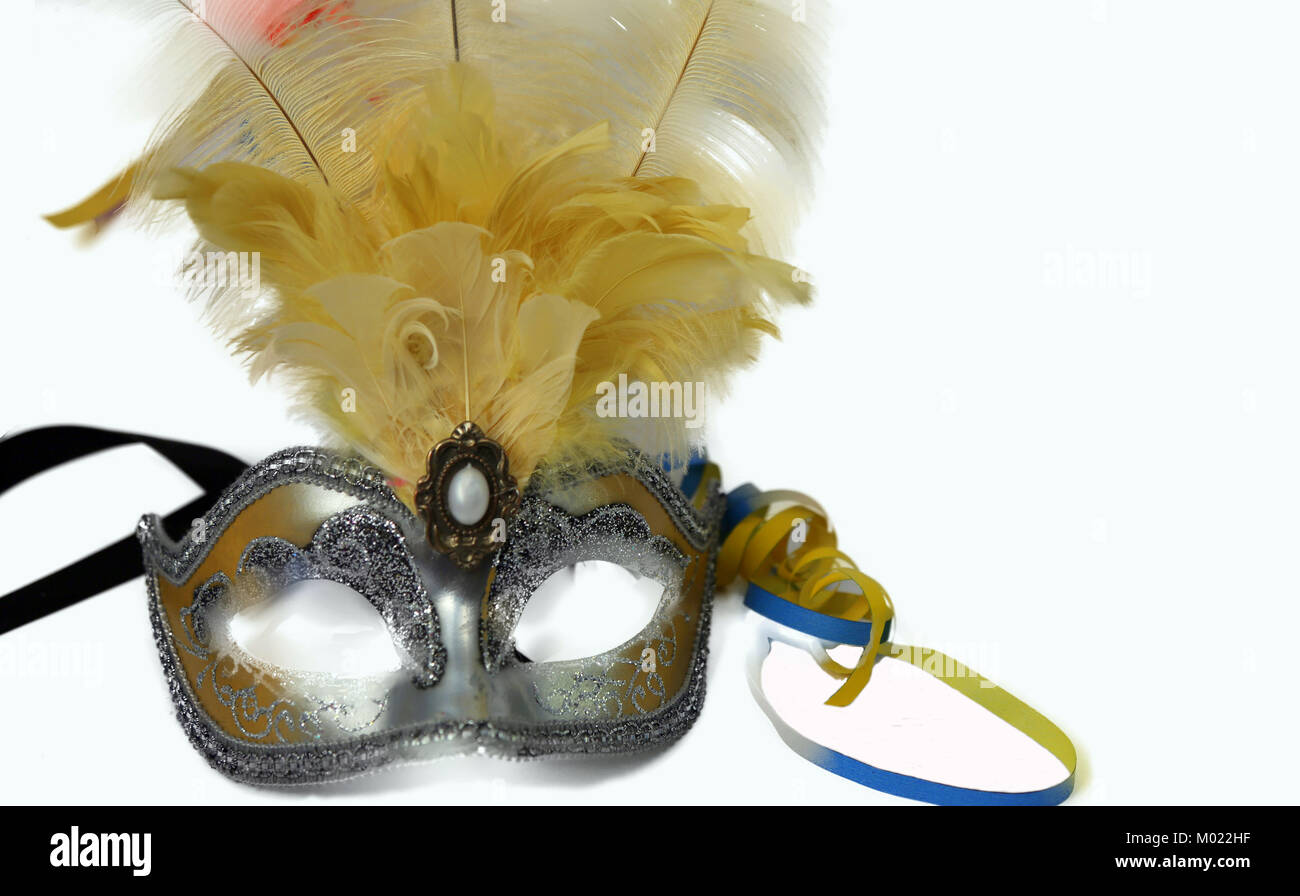 Silver carnival venetian mask with feathers and colorful serpentine ...