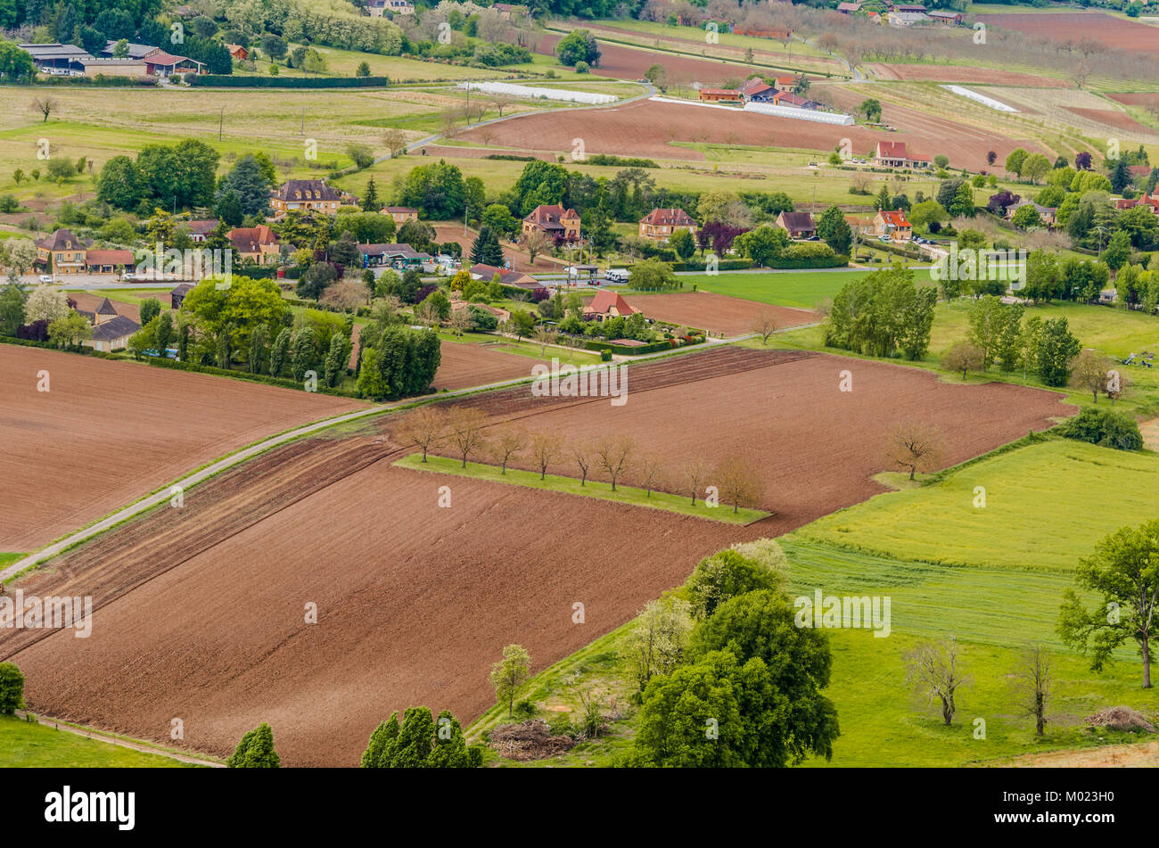 in the valley of the river Dordogne is this landscape of farmland and ...