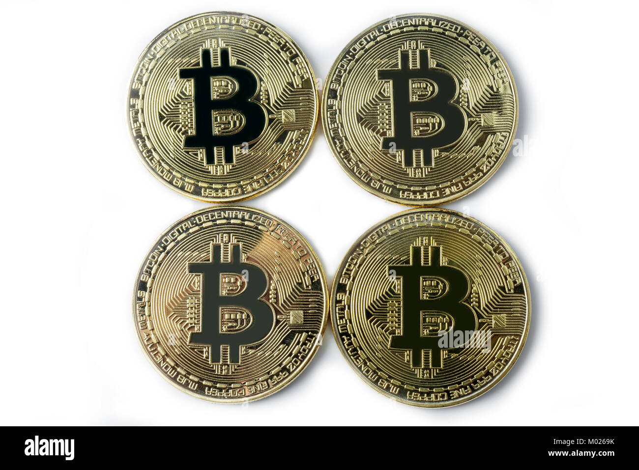 Four bitcoin on a white background. Modern currency, a cryptocurrency ...