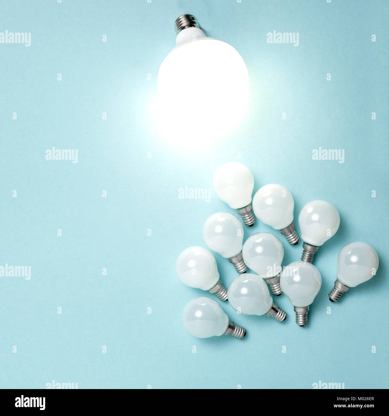 One light bulb outstanding, glowing different. Business creativity idea ...