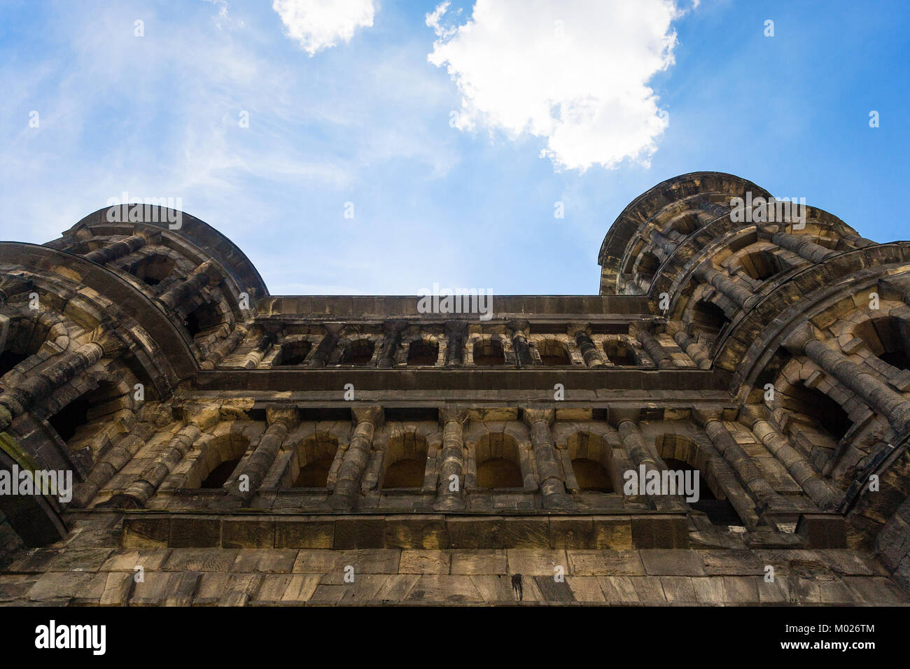 travel to Germany - wall of ancient roman city gate Porta Nigra (Black ...
