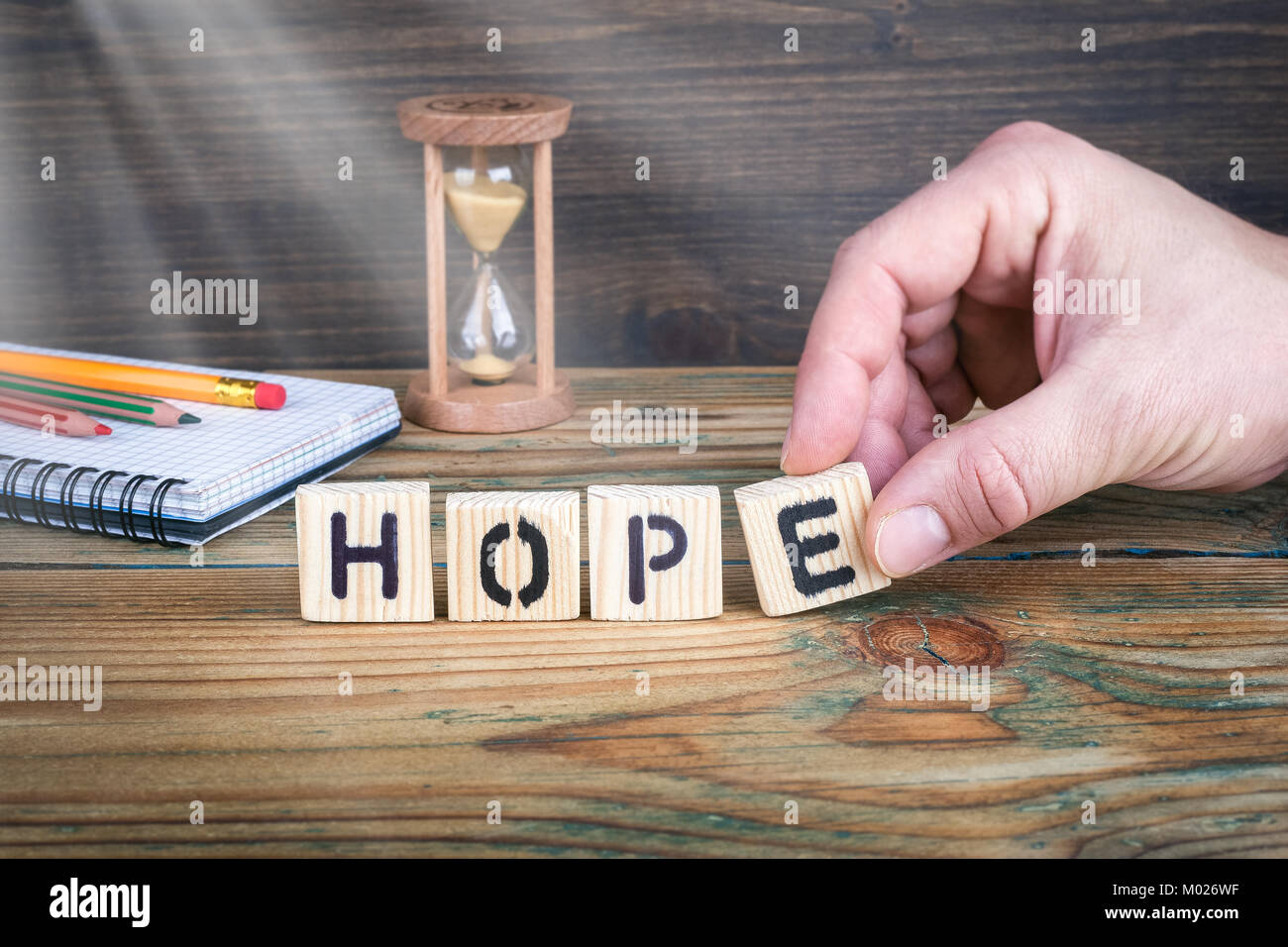 hope. Wooden letters on the office desk, informative and communication ...