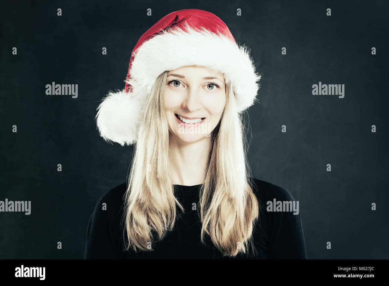Happy curly girl in santa hi-res stock photography and images - Alamy