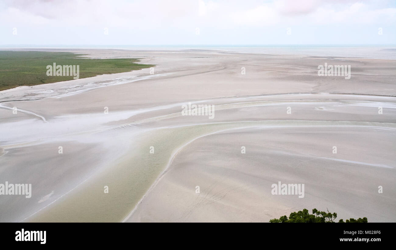 Travel to France - above view of silted tidal bay in low tide around Le ...