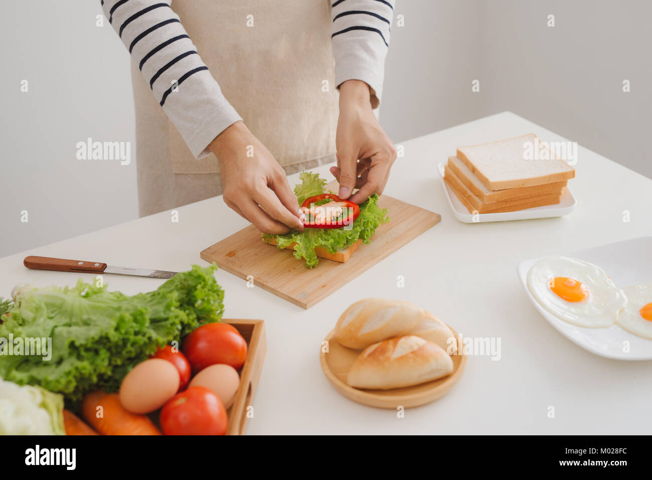 Man making sandwich kitchen hi-res stock photography and images - Alamy