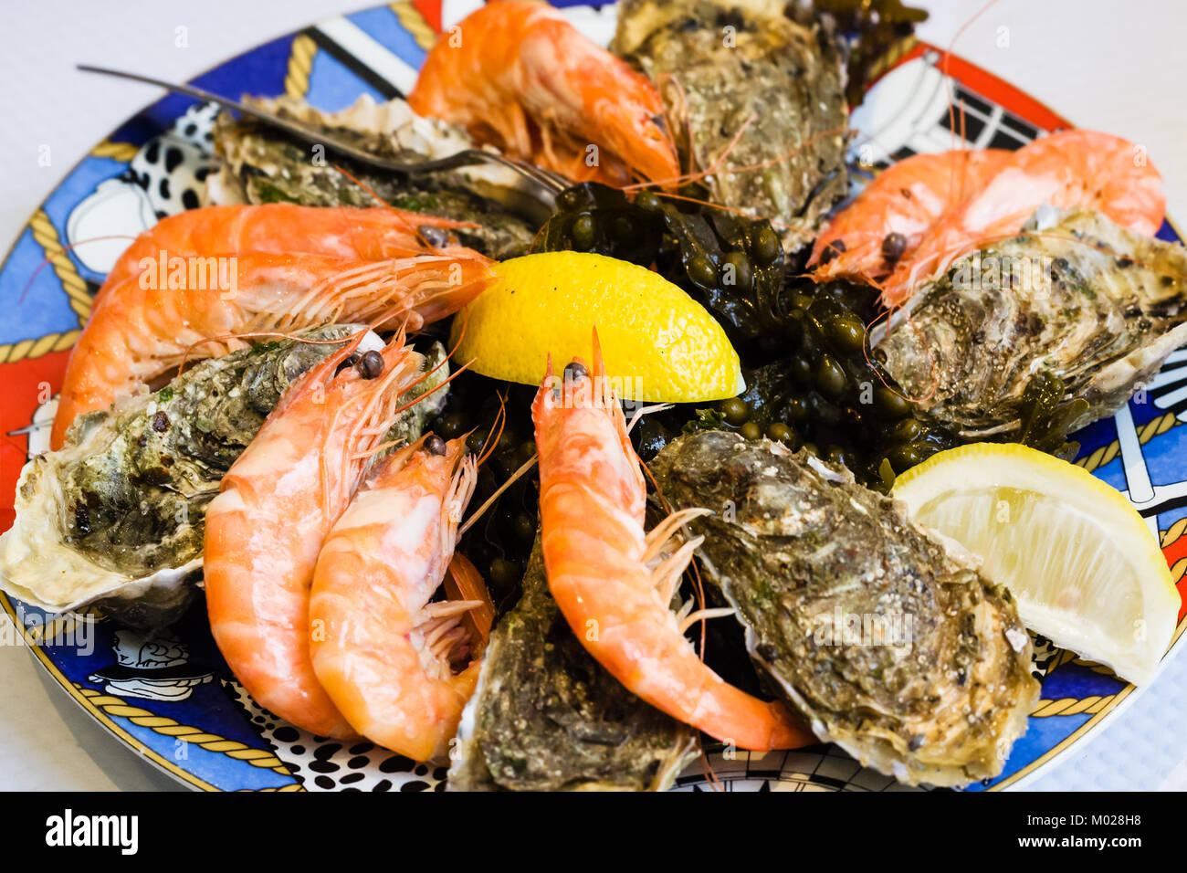 travel to France - atlantic seafood plate with prawns and oysters in ...