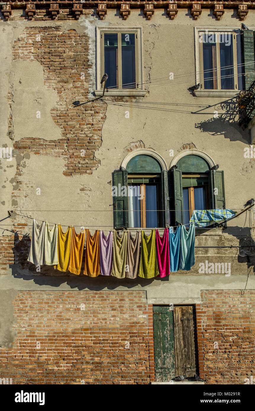 A rainbow of colourful laundry on a washing line, Venice Italy Stock ...