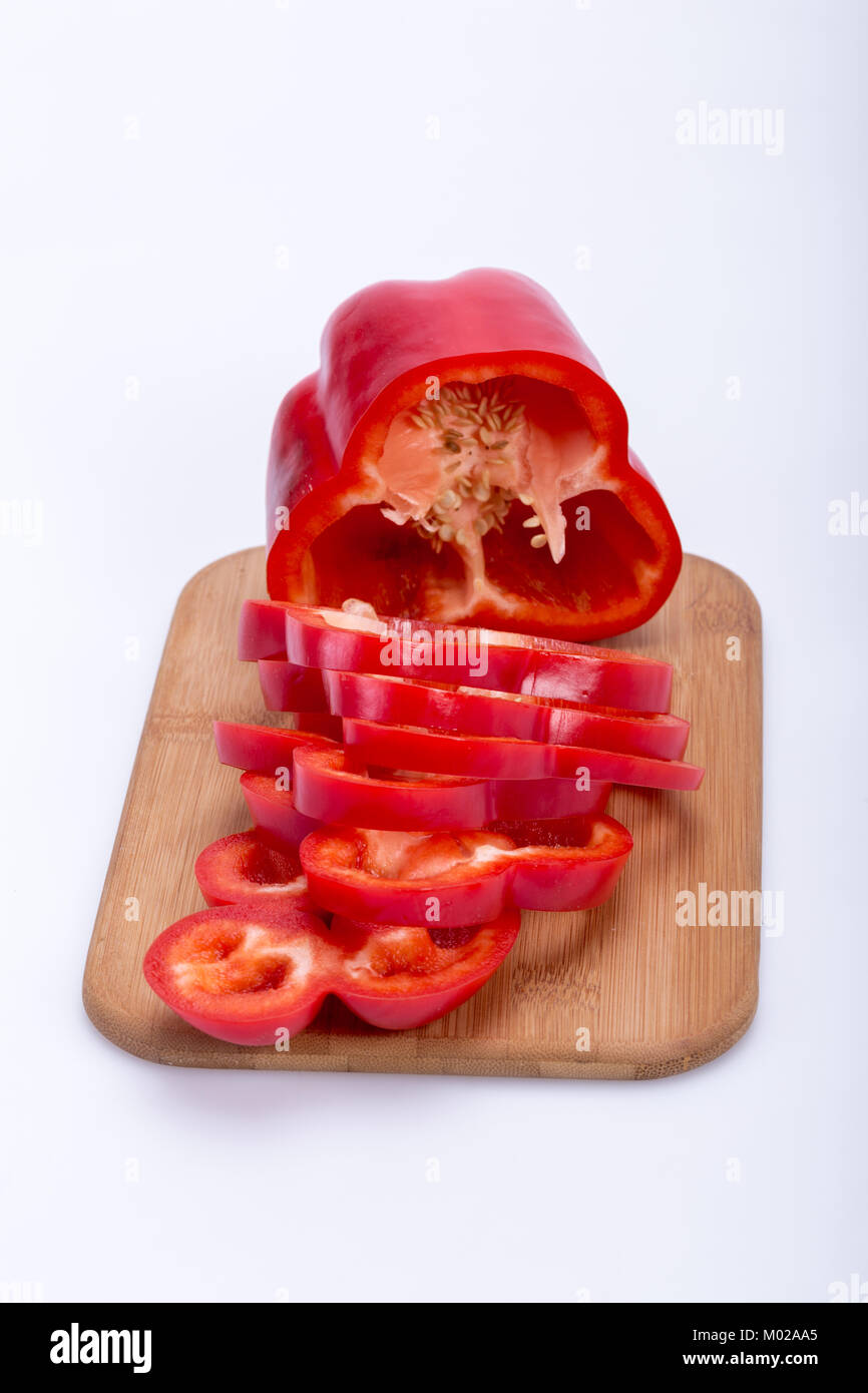 Sliced red pepper isolated on white background Stock Photo - Alamy