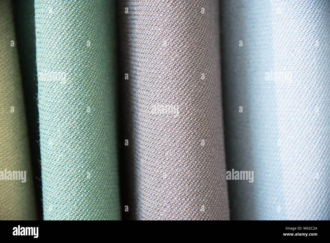 Multi color fabric texture samples as a background Stock Photo - Alamy