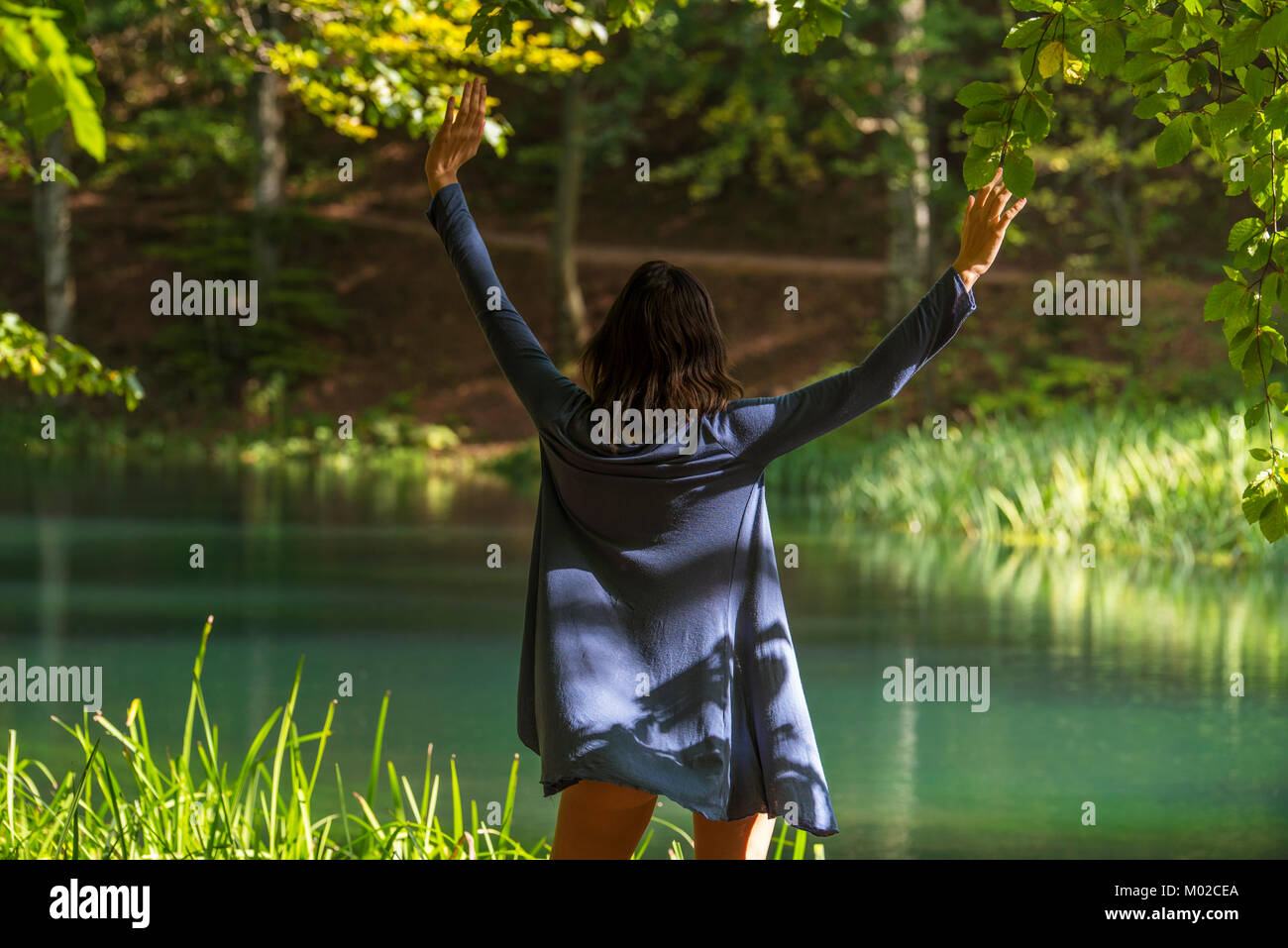 Beautiful young girl in the forest Stock Photo - Alamy
