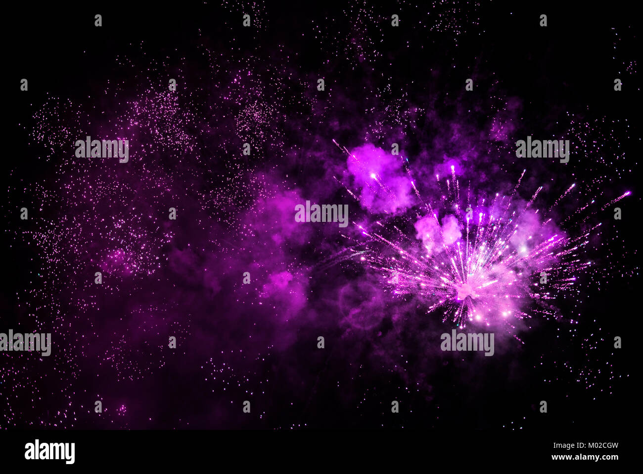 Beautiful holiday fireworks in the dark sky Stock Photo - Alamy