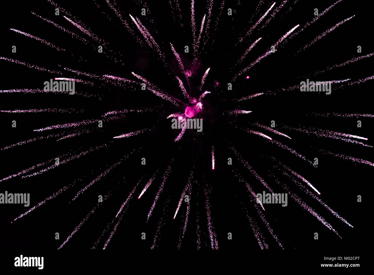 Beautiful holiday fireworks in the dark sky Stock Photo - Alamy