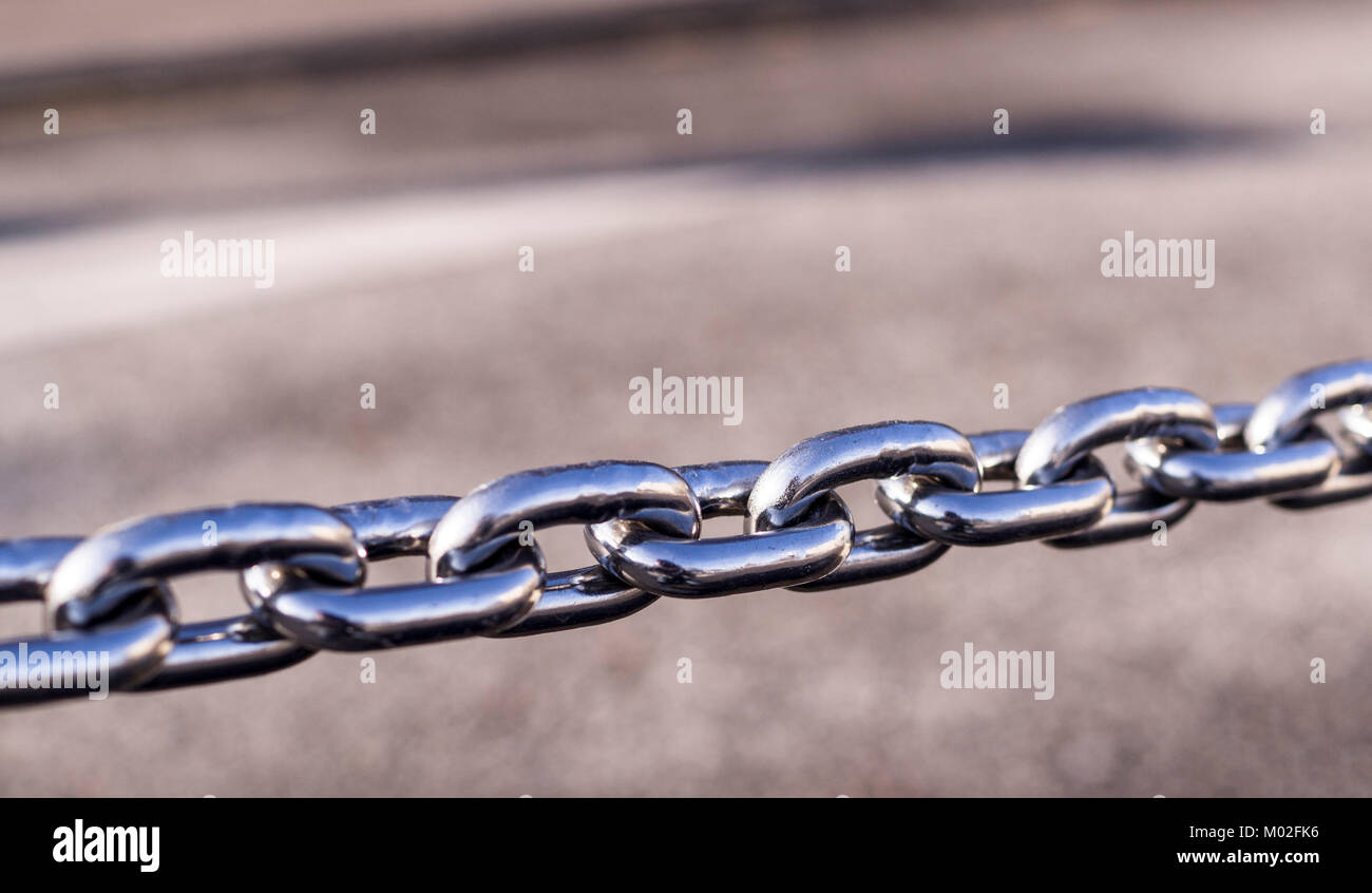 shiny steel chain city background. decoration, boarder Stock Photo - Alamy