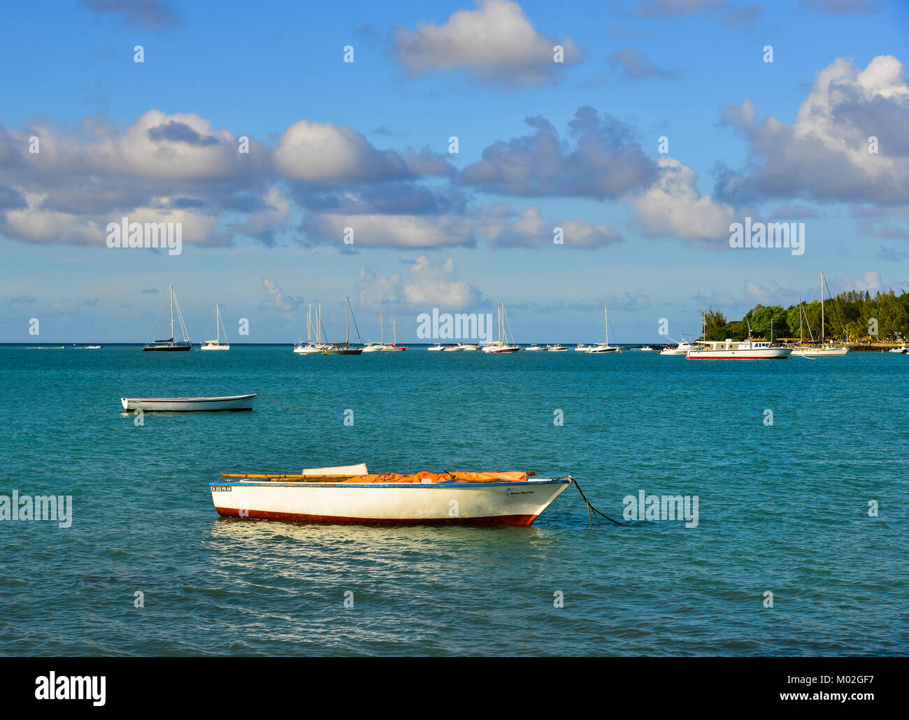 Grand Baie, Mauritius - Jan 9, 2017. Small boats on beautiful sea at ...