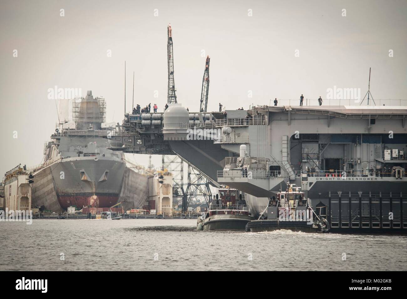 The aircraft carrier USS Dwight D. Eisenhower (CVN 69)(Ike) prepares to ...