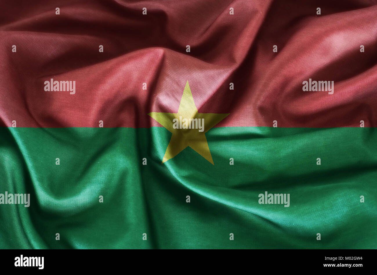 Burkina Faso flag pattern on the fabric texture ,vintage style Stock ...