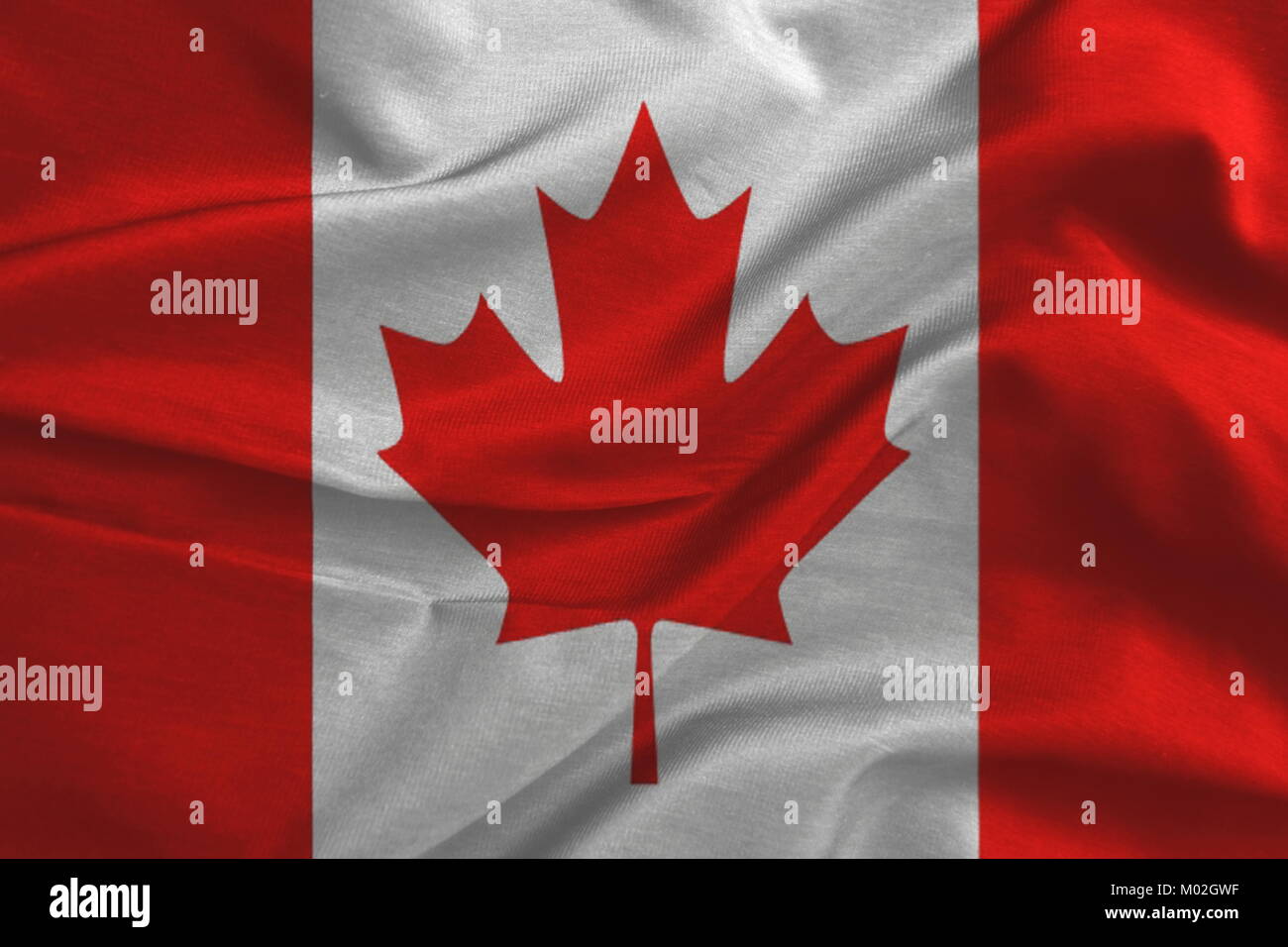 Canada flag on silk fabric Stock Photo - Alamy