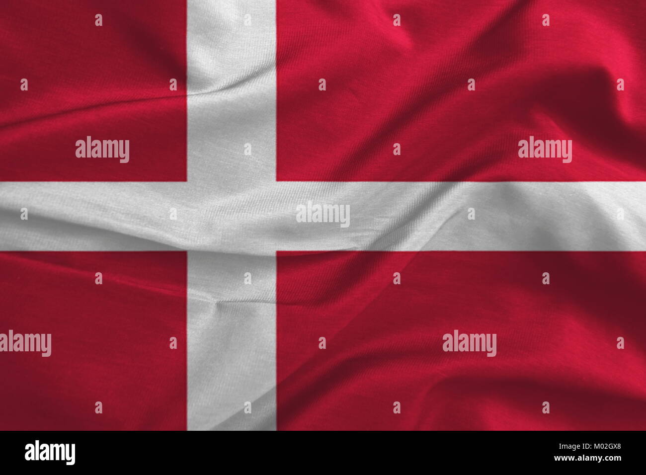 Waving flag of Denmark. Flag has real fabric texture Stock Photo - Alamy