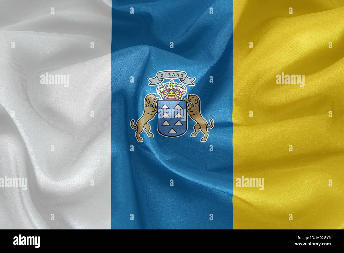 Canary Islands flag pattern on the fabric texture Stock Photo - Alamy