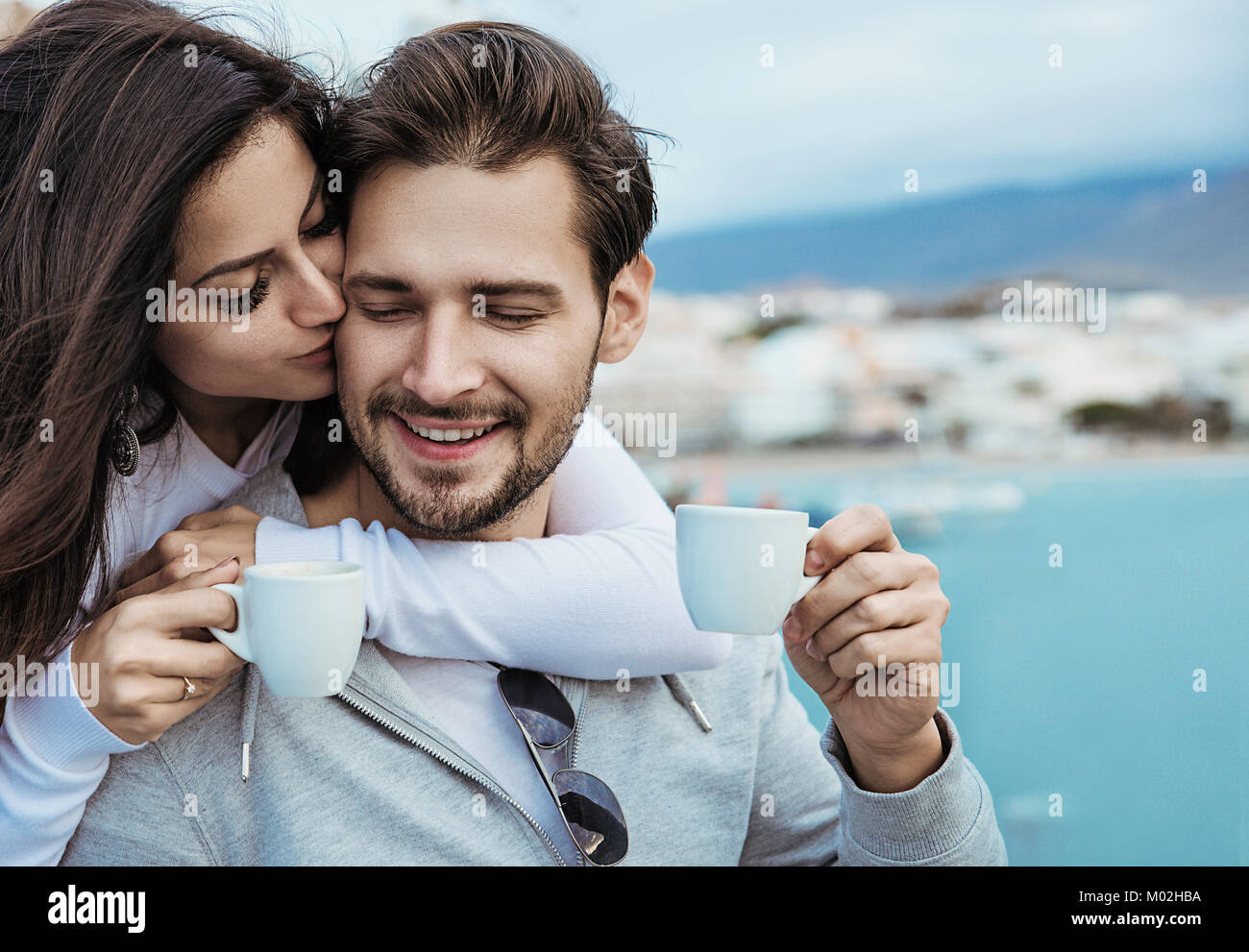 Romantic, relaxed couple drinking a mornig cup of coffee Stock Photo ...