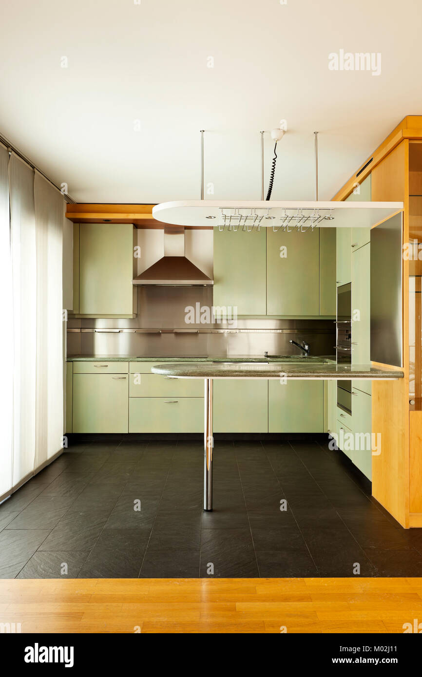 Kitchen front view, beautiful apartment, interior Stock Photo - Alamy