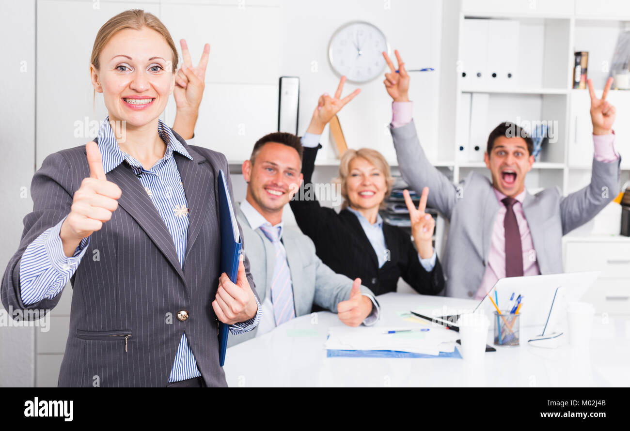 Team emotionally celebrating success hi-res stock photography and ...
