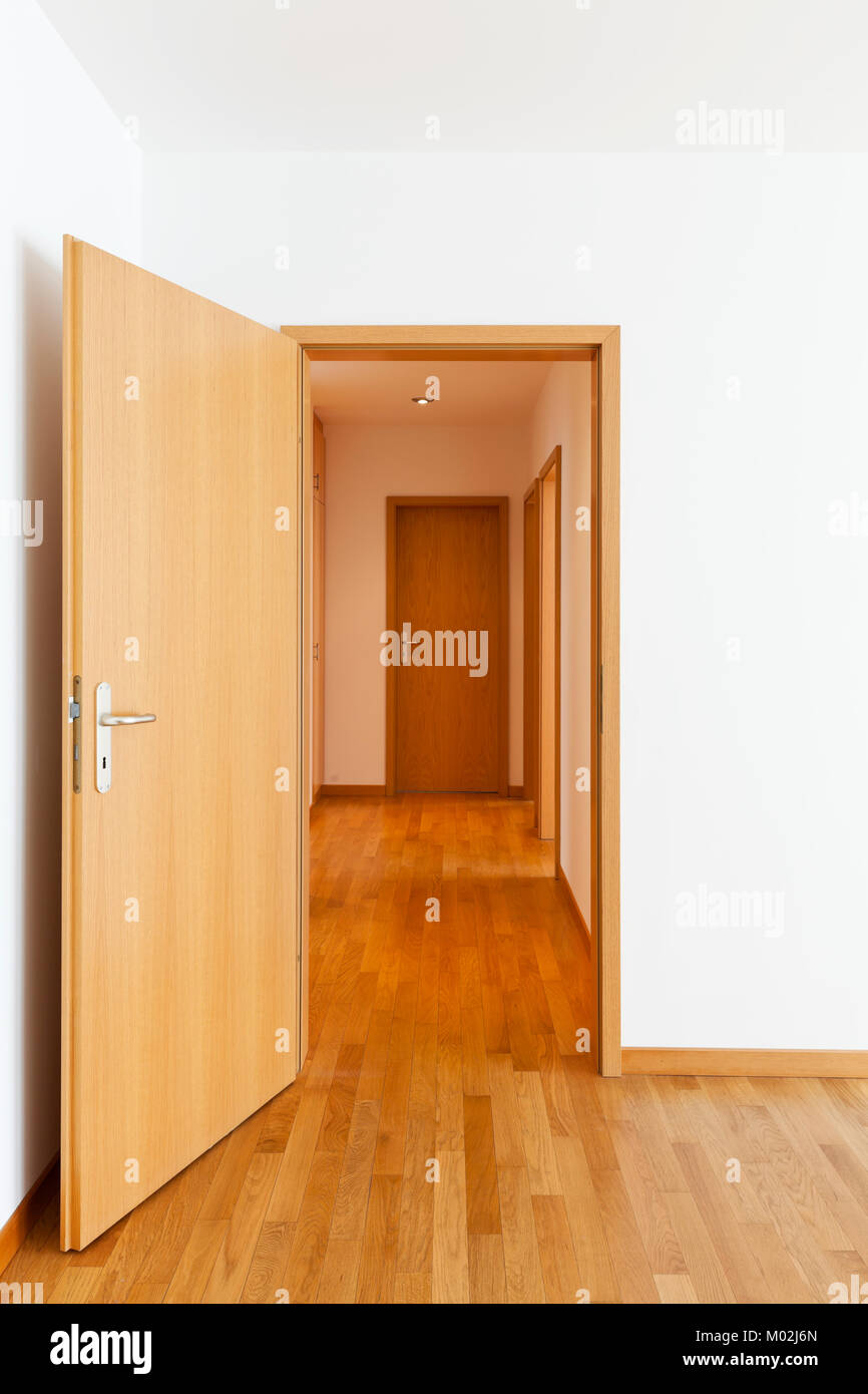 beautiful apartment, interior, wooden door open Stock Photo - Alamy