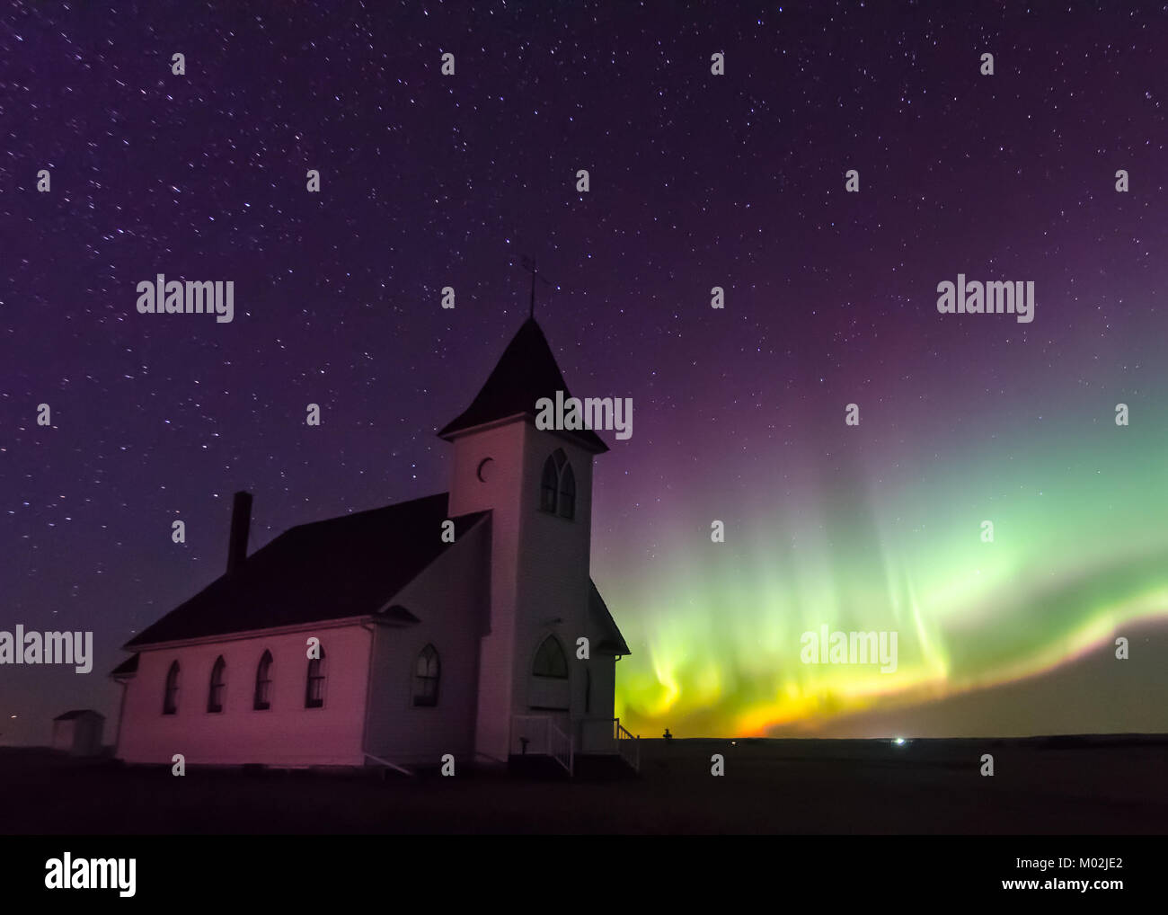 Aurora borealis over church hi-res stock photography and images - Alamy
