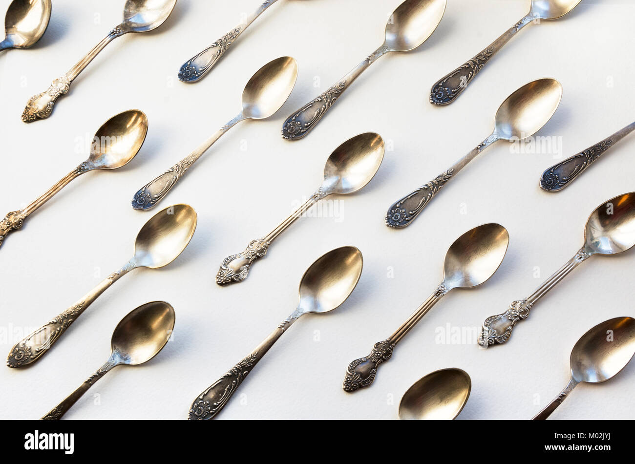 Spoon pattern on white background. Kitchen texture Stock Photo - Alamy