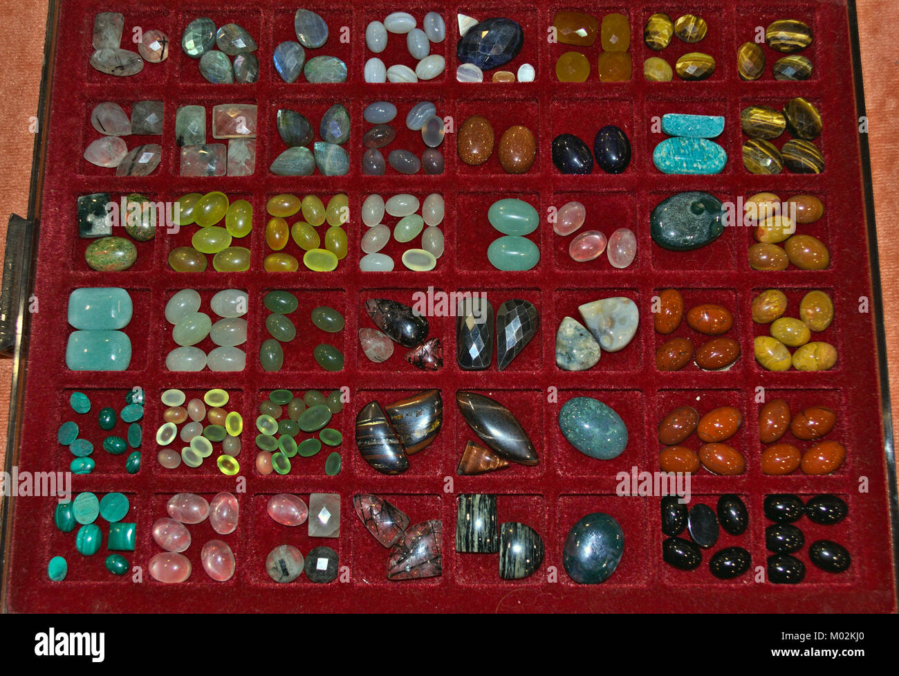 Lot of various different crystals displayed in showcase Stock Photo - Alamy